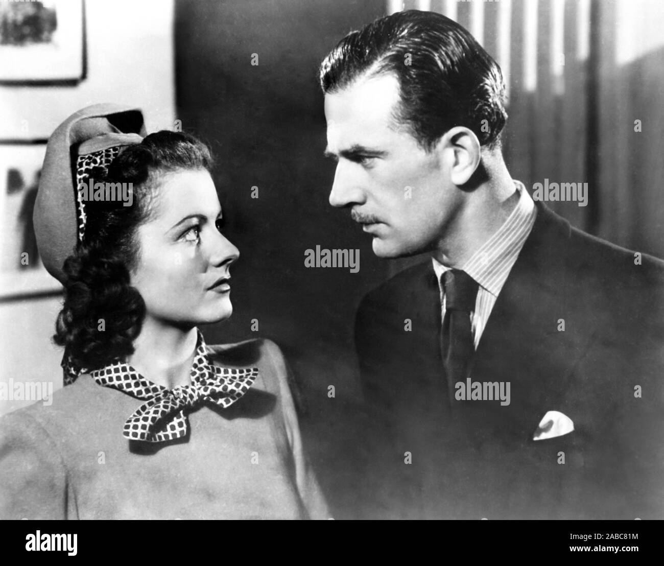 ALIBI, from left, Margaret Lockwood, Hugh Sinclair, 1942 Stock Photo ...