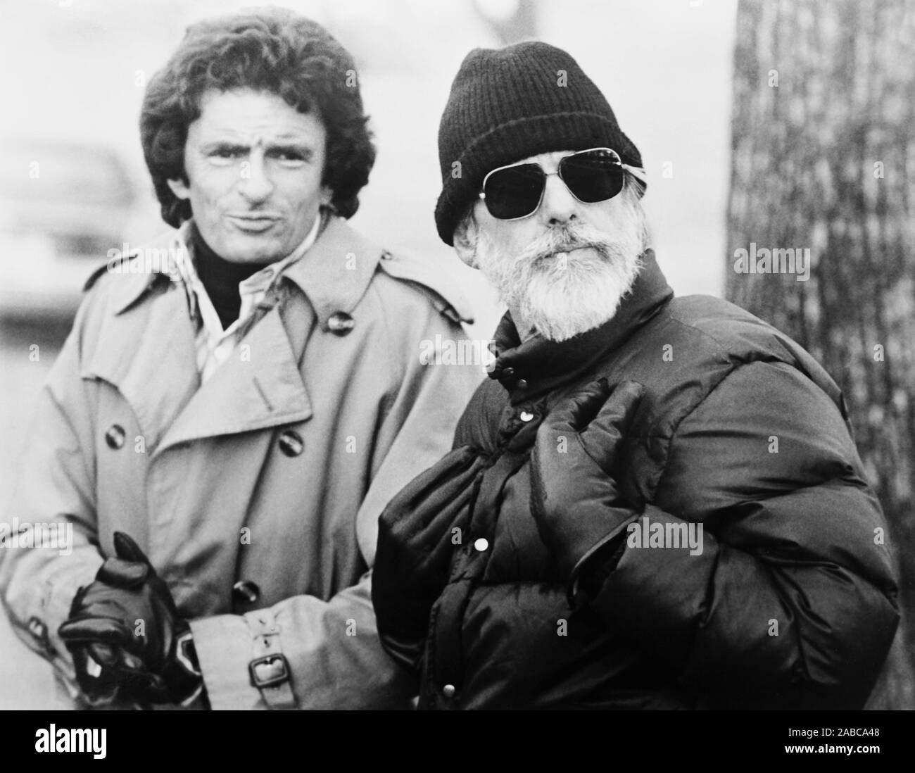 BEING THERE, from left: novelist/screeneriter Jerzy Kosinski, director Hal Ashby on set, 1979 ...