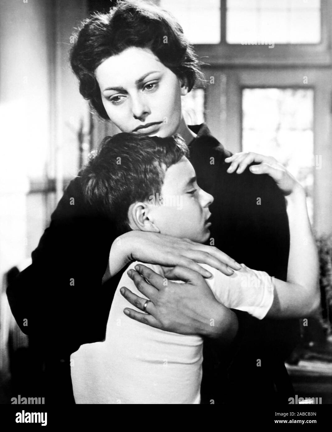 THE BLACK ORCHID, Sophia Loren, hugging Jimmy Baird, 1958 Stock Photo ...