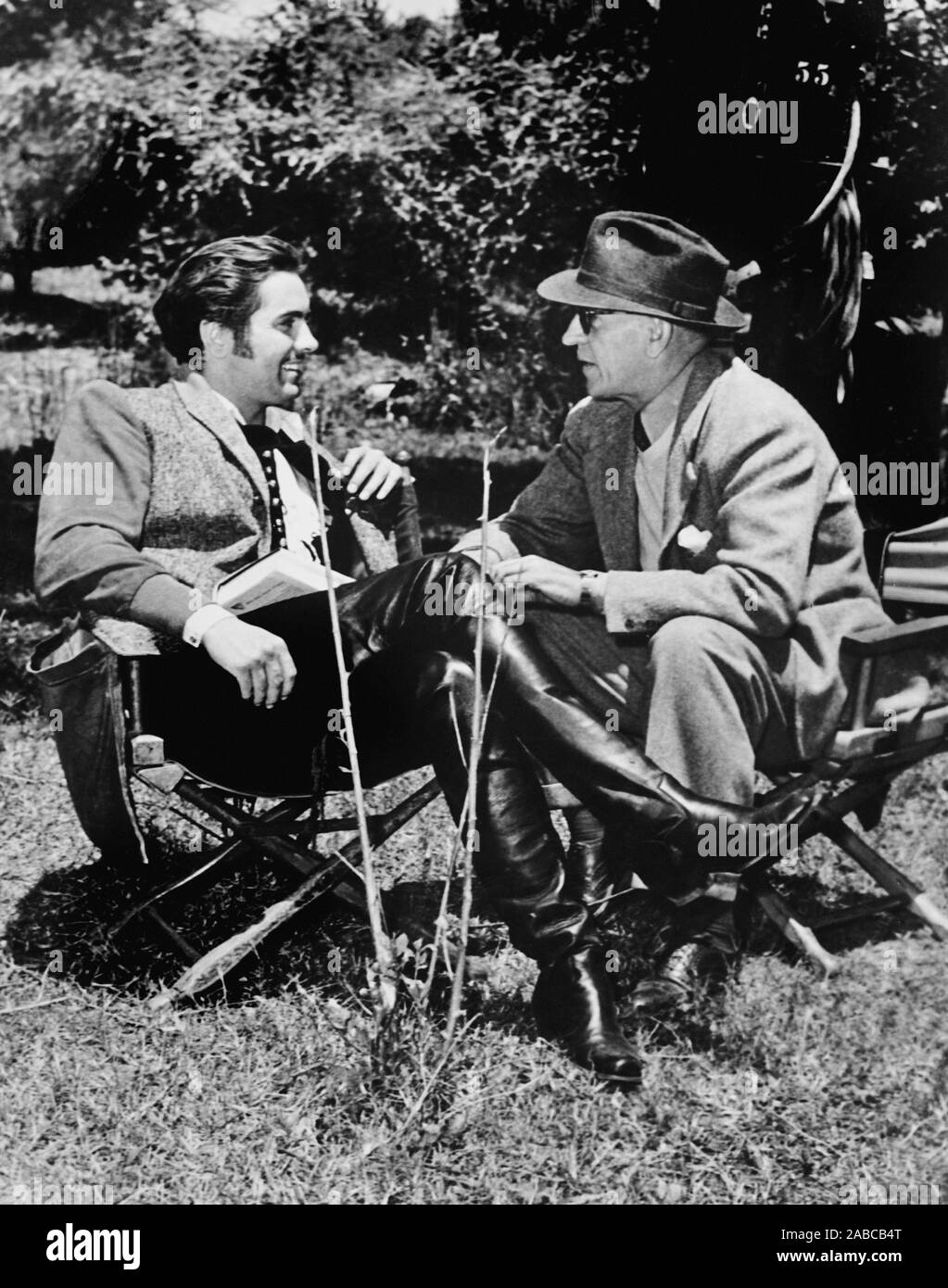 THE BLACK SWAN, from left: Tyrone Power, director Henry King on set ...