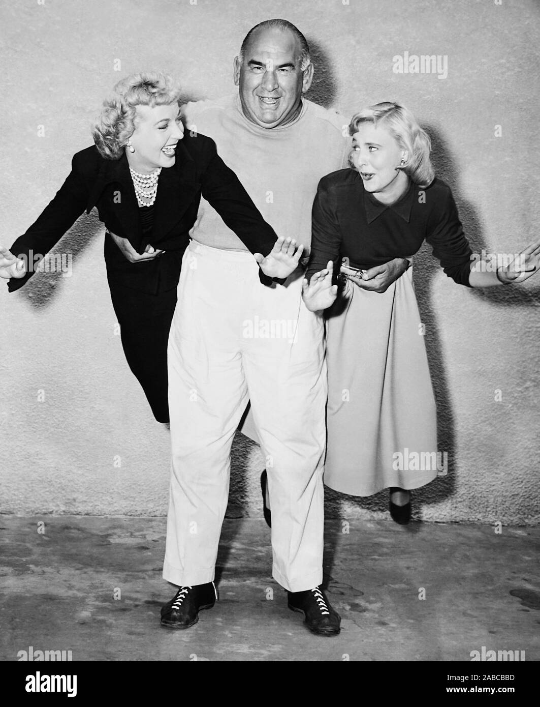 BODYHOLD, Ed 'Strangler' Lewis holding the bodies of Hillary Brooke ...