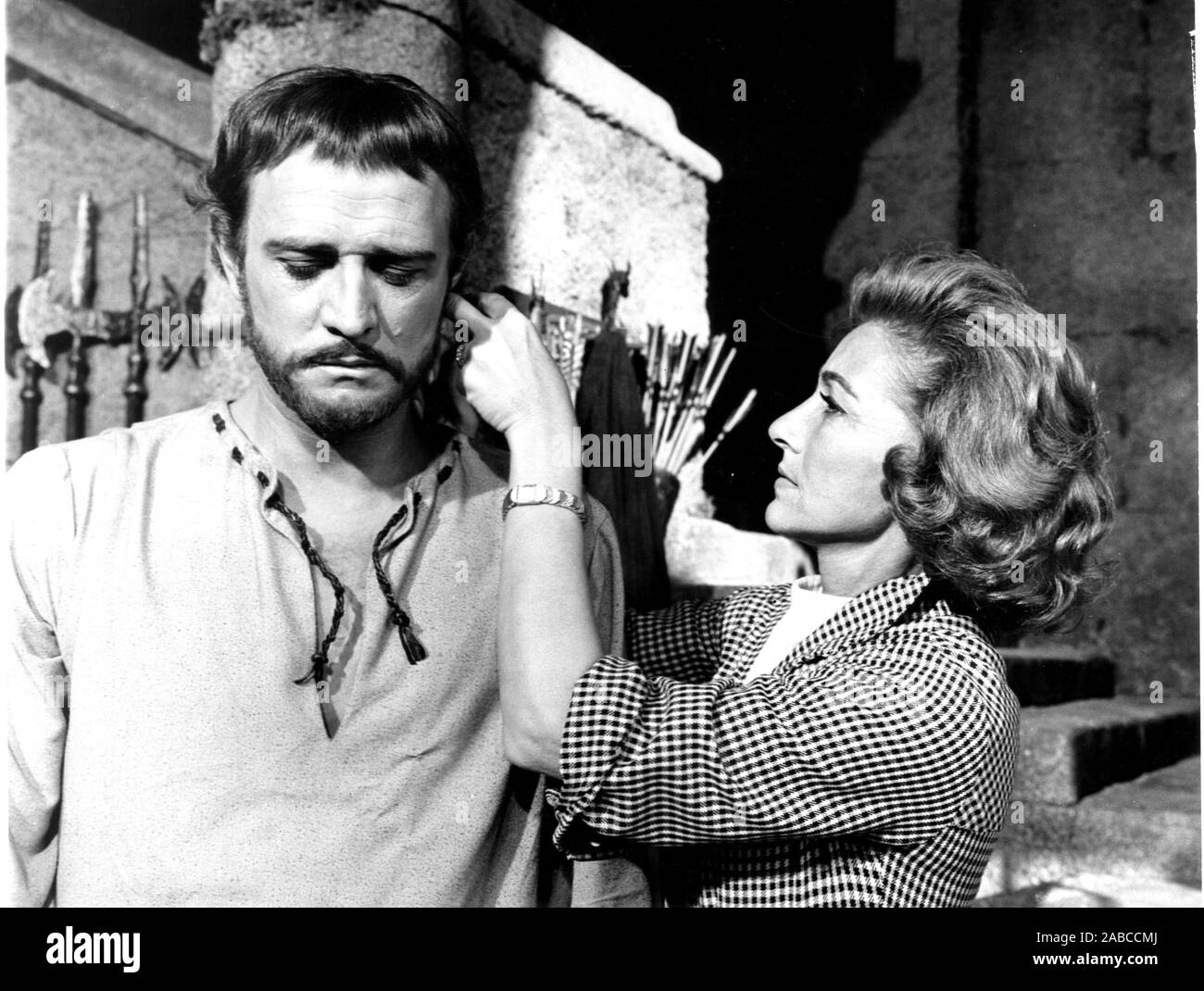 CAMELOT, Richard Harris, being tended to on-set by hairdresser Naomi ...