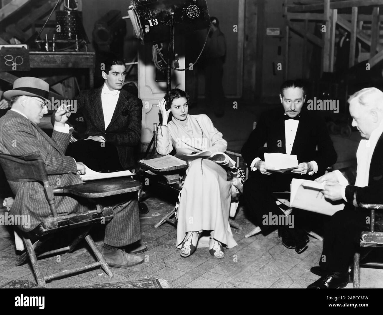 CAFE METROPOLE, from left: director Edward H. Griffith, Tyrone Power ...