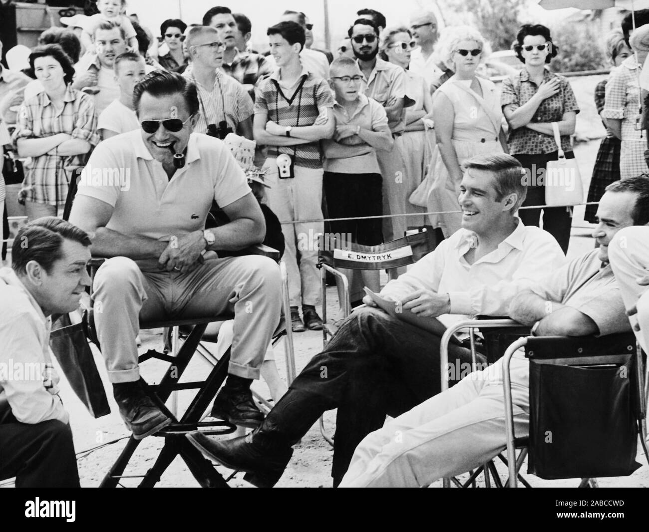 THE CARPETBAGGERS, from left: Alan Ladd, director Edward Dmytryk ...