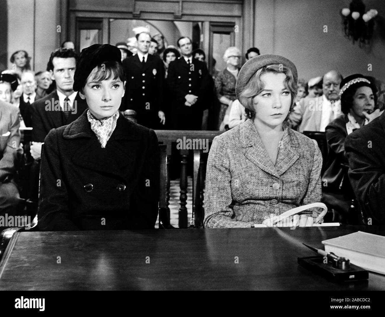 THE CHILDREN'S HOUR, from left, James Garner (back), Audrey Hepburn ...
