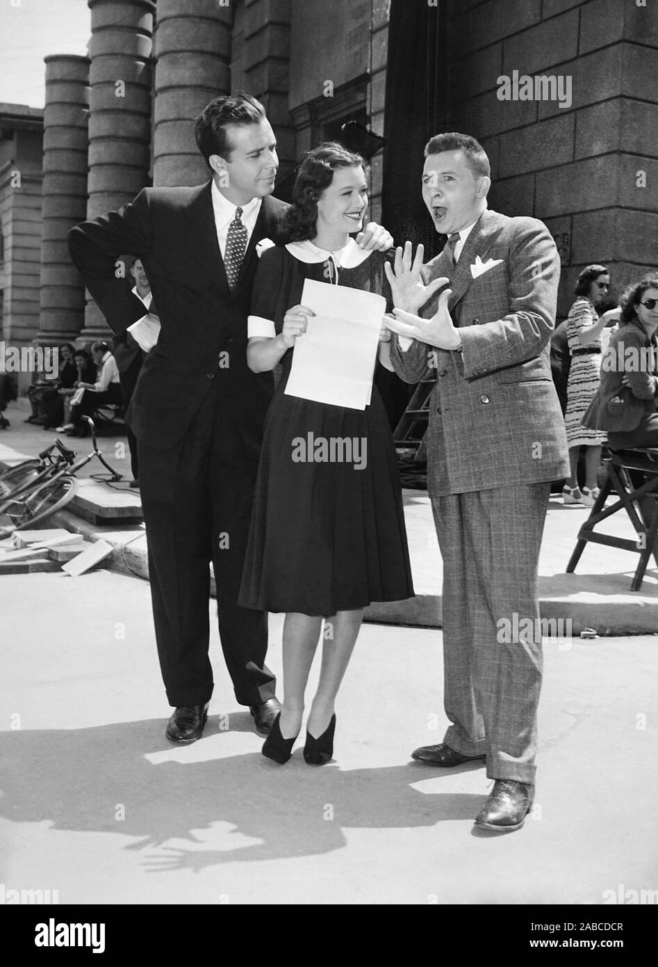 CHRISTMAS IN JULY, from left: Dick Powell, Ellen Drew visited by Eddie ...