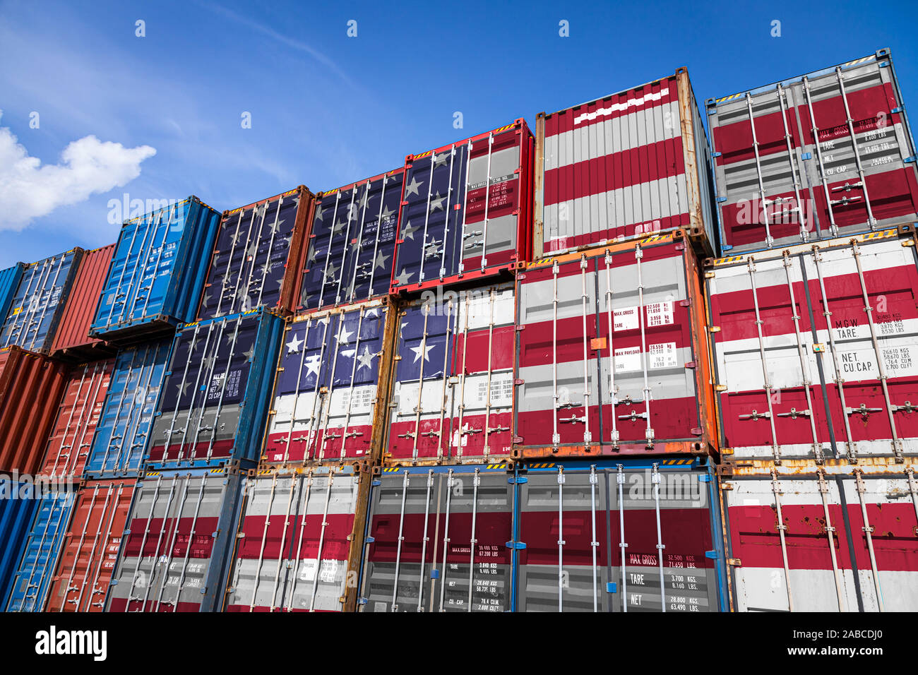 The national flag of USA on a large number of metal containers for ...