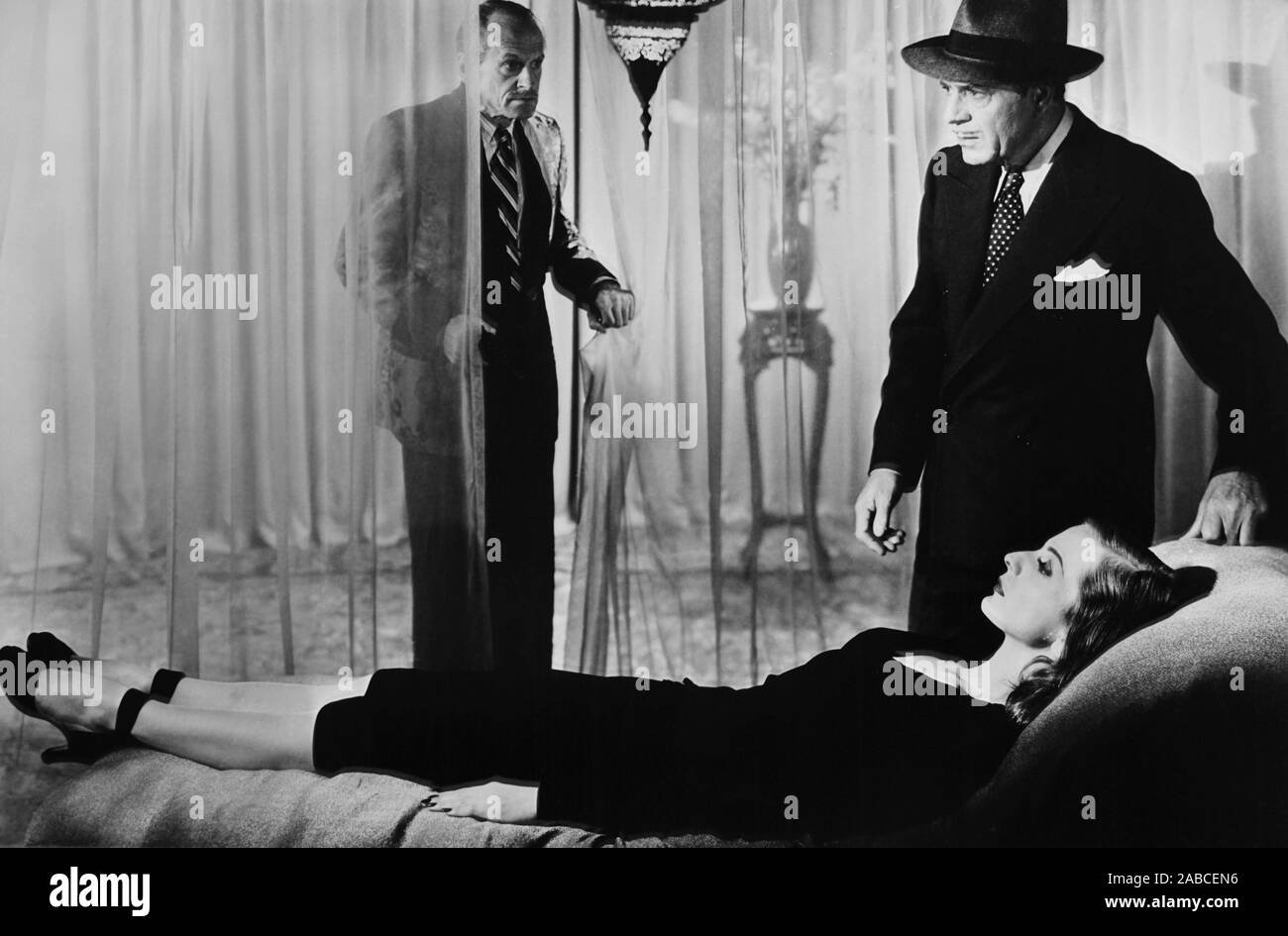 THE CRIME DOCTOR'S WARNING, standing from left: Miles Mander, Warner ...