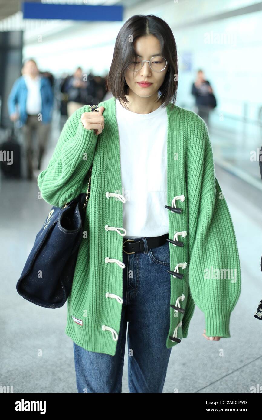 Chinese supermodel Liu Wen arrives at a Beijing airport after landing ...