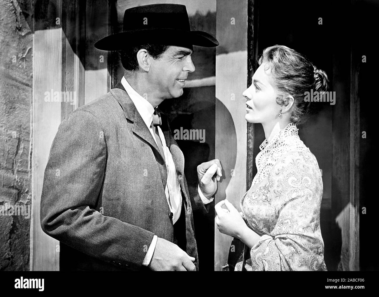 DAY OF THE BADMAN, from left, Fred MacMurray, Joan Weldon, 1958 Stock ...