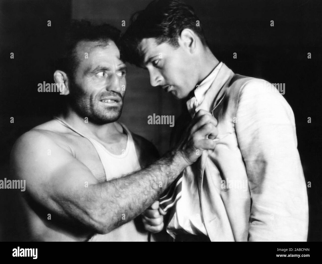 DANGEROUS PARADISE, from left: George Kotsonaros, Richard Arlen, 1930 ...