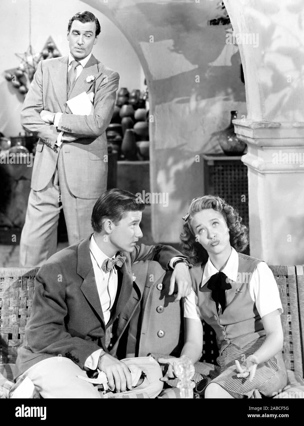 HOLIDAY IN MEXICO, from left, Walter Pidgeon, Roddy McDowall, Jane ...