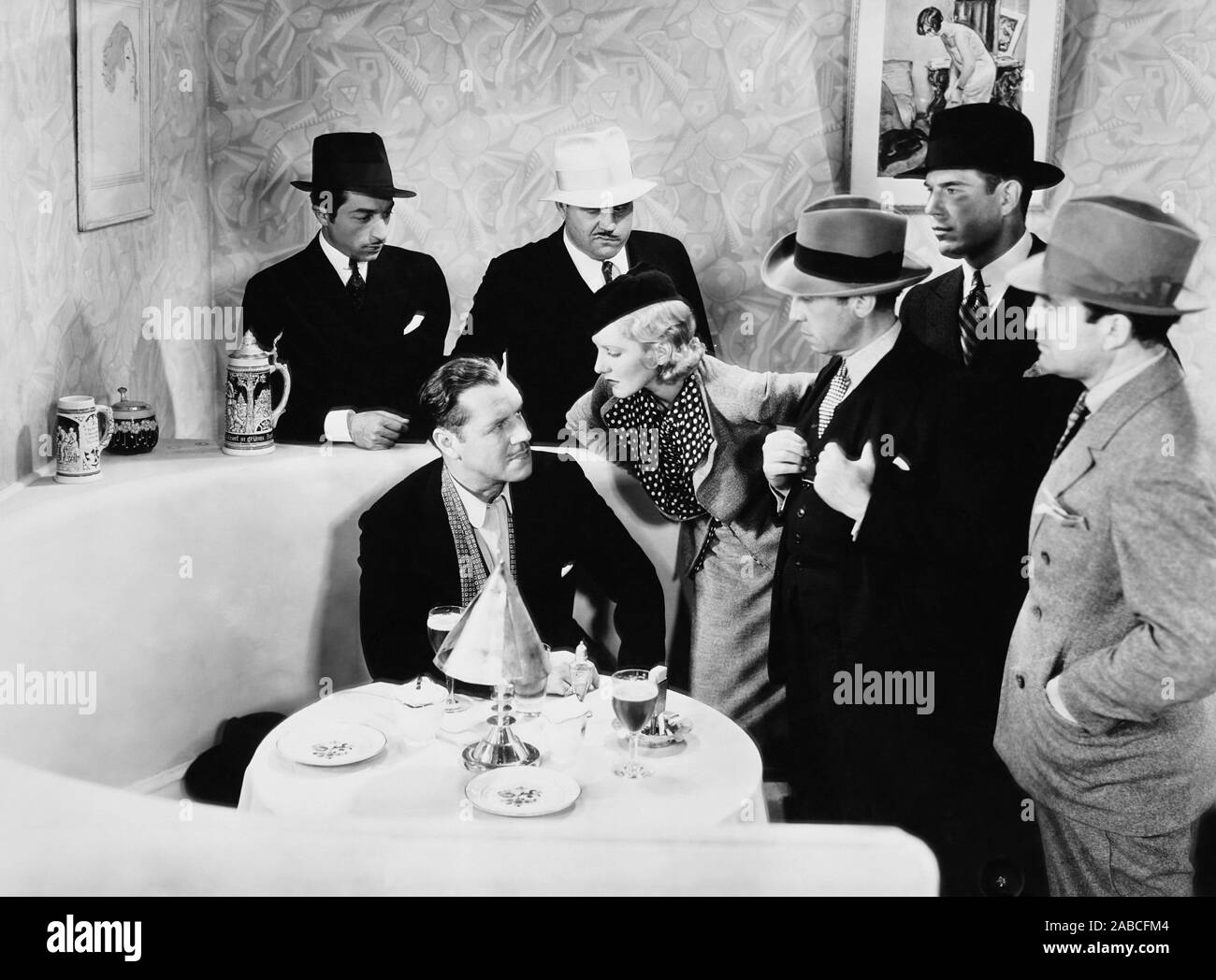 THE DEFENSE RESTS, front from left: Jack Holt, Jean Arthur, Raymond ...