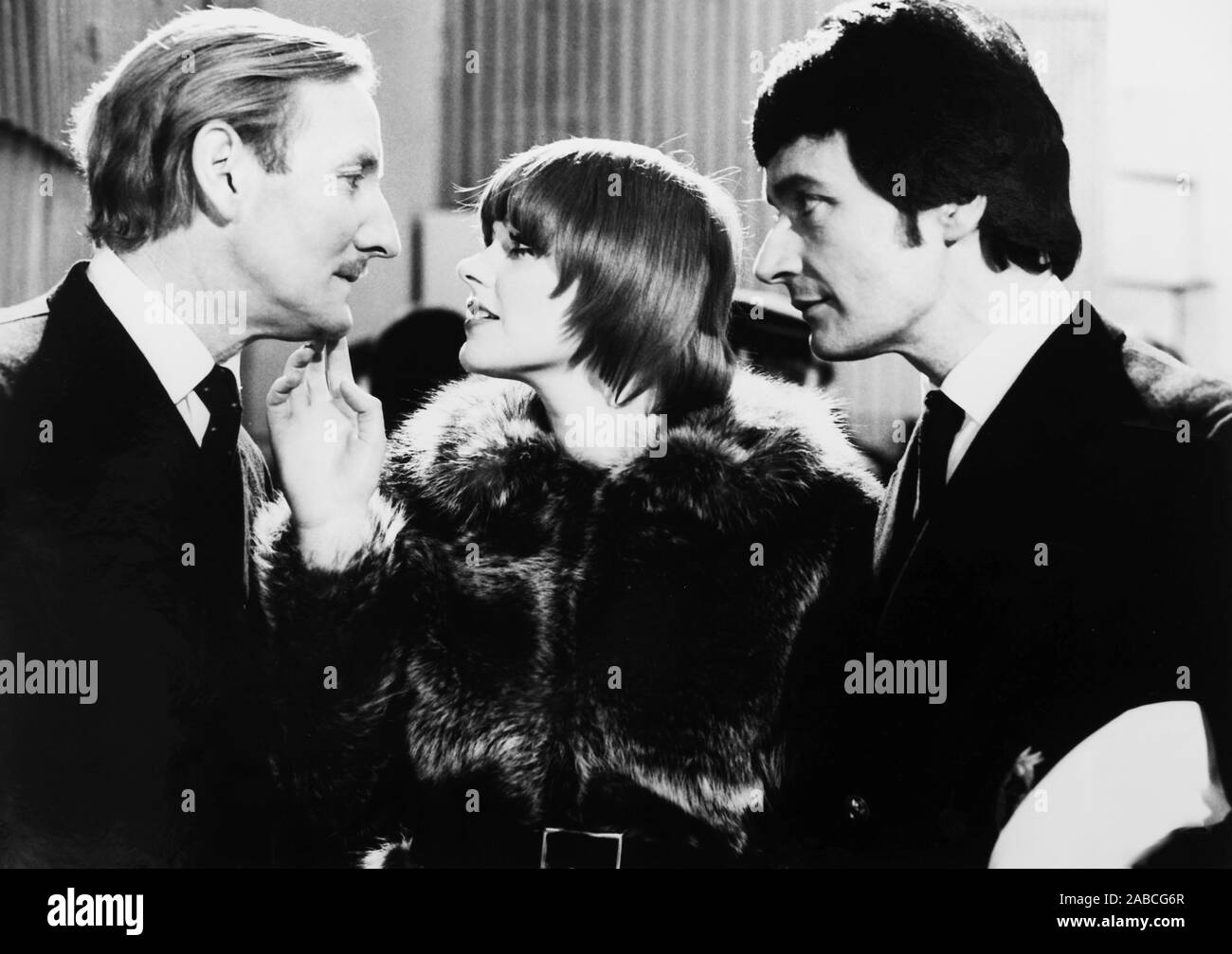 DOCTOR IN TROUBLE, Leslie Phillips (left), Marcia Fox (center), 1970 ...