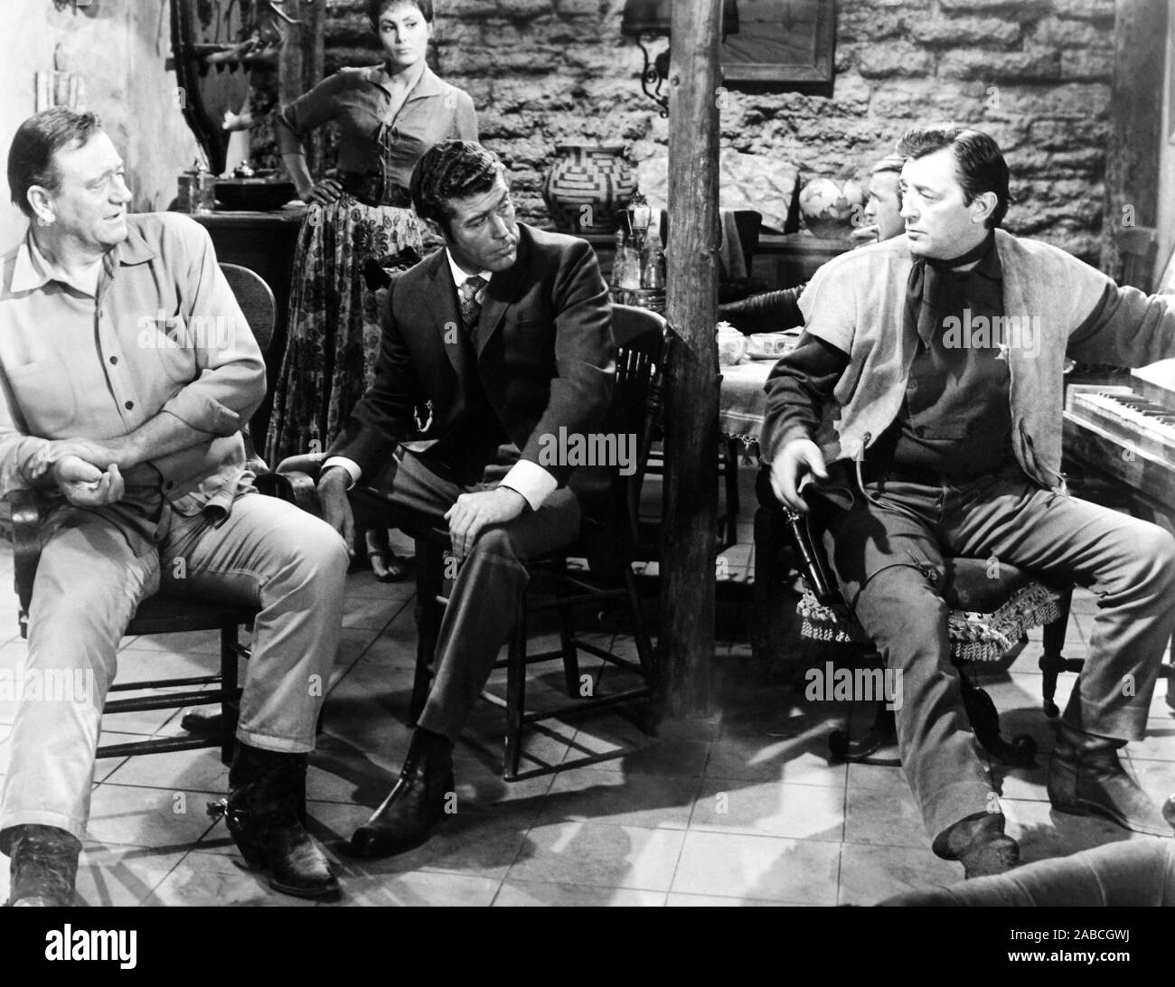 EL DORADO, from left, John Wayne, Charlene Holt, Christopher George ...