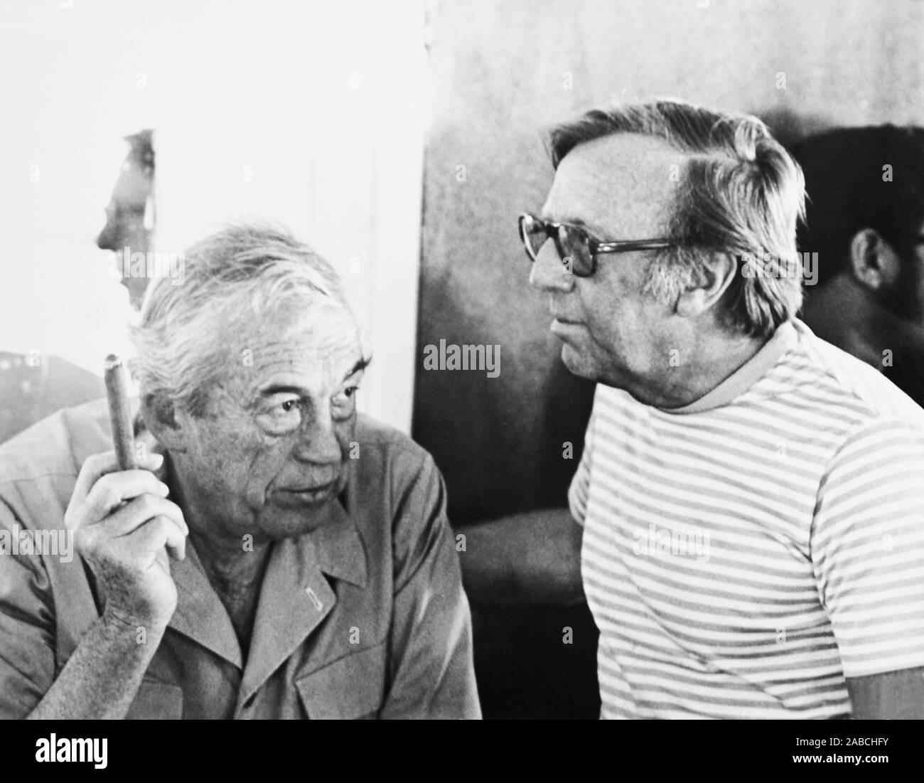 FAT CITY, from left: director John Huston, producer Ray Stark on set ...