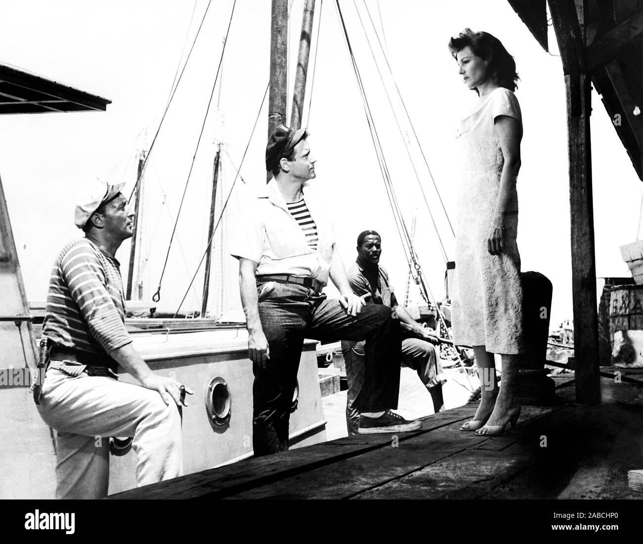 FIRE DOWN BELOW, from left, Robert Mitchum, Jack Lemmon, Edric Connor ...