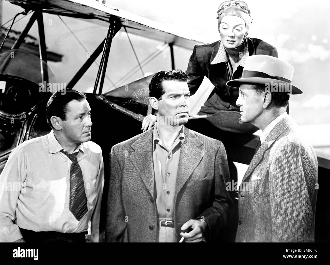 FLIGHT FOR FREEDOM, from left, Herbert Marshall, Fred MacMurray ...