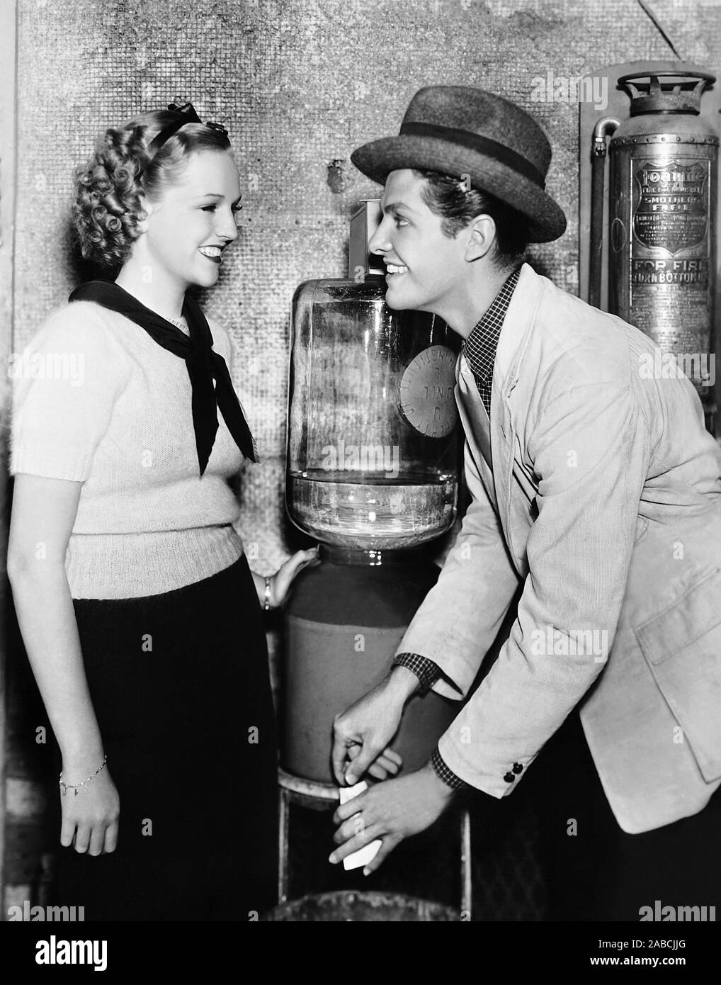 FORGOTTEN FACES, from left: Betty Jane Rhodes, Robert Cummings on set ...