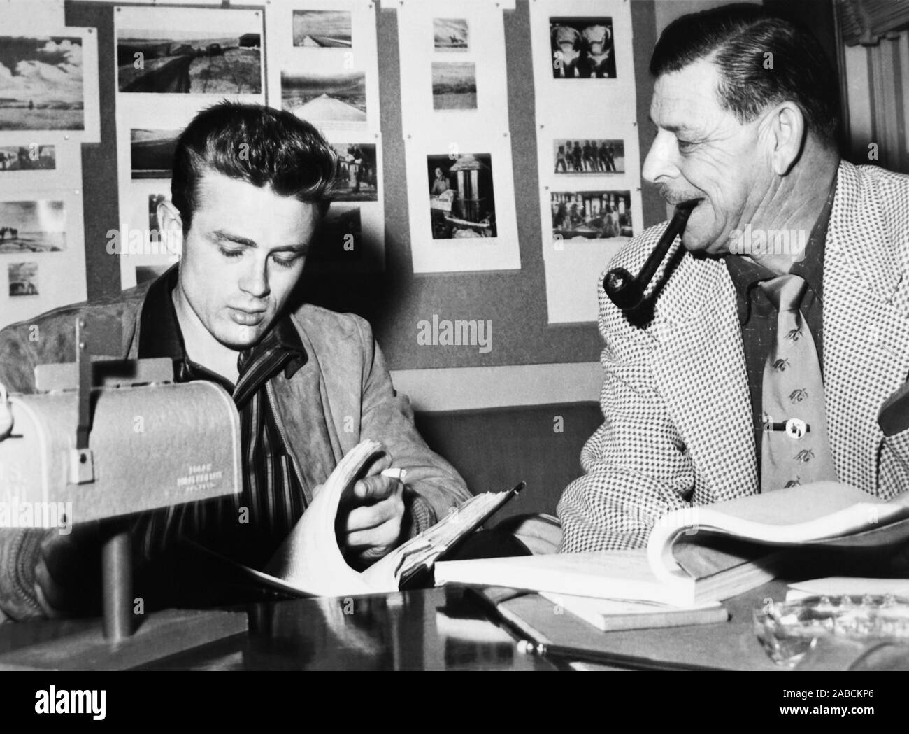 GIANT, from left: James Dean, screenwriter Fred Guiol, 1956 Stock Photo ...