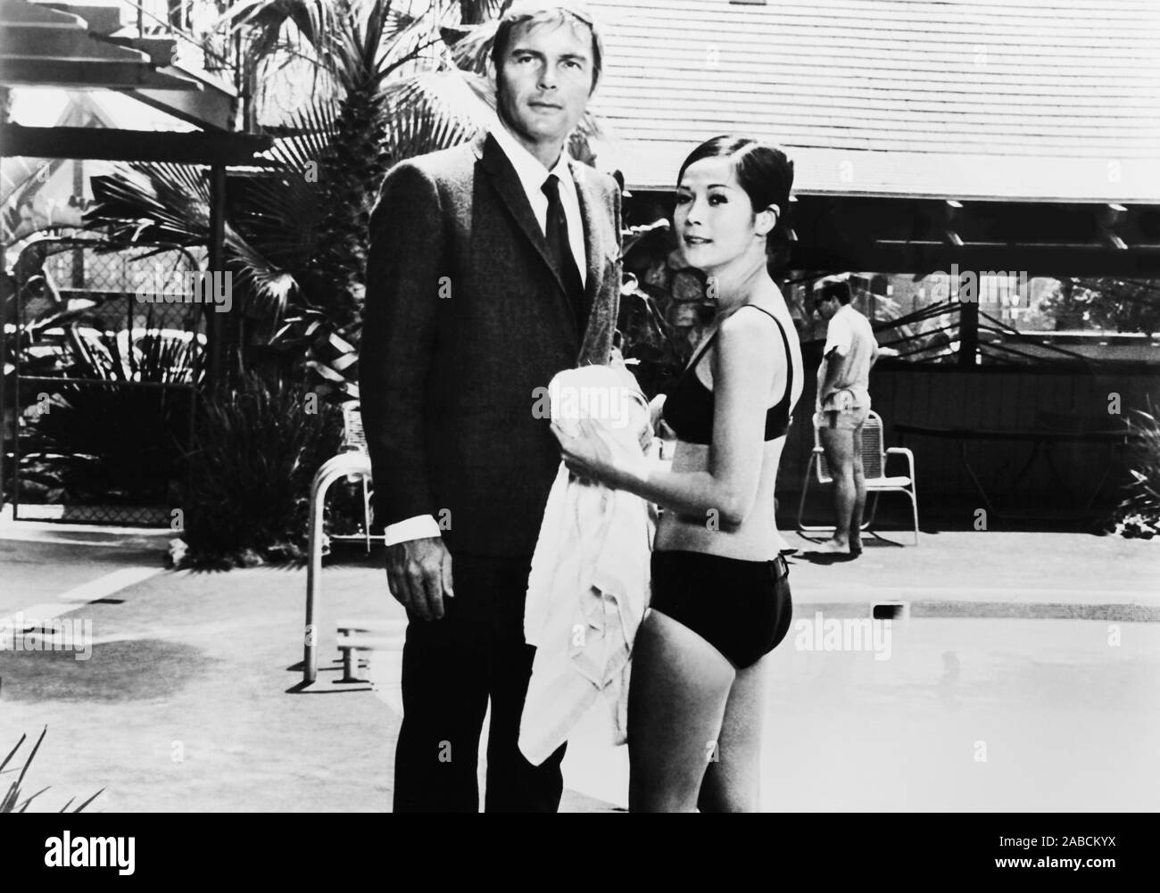 THE GIRL WHO KNEW TOO MUCH, from left: Adam West, Nancy Kwan, 1969 ...