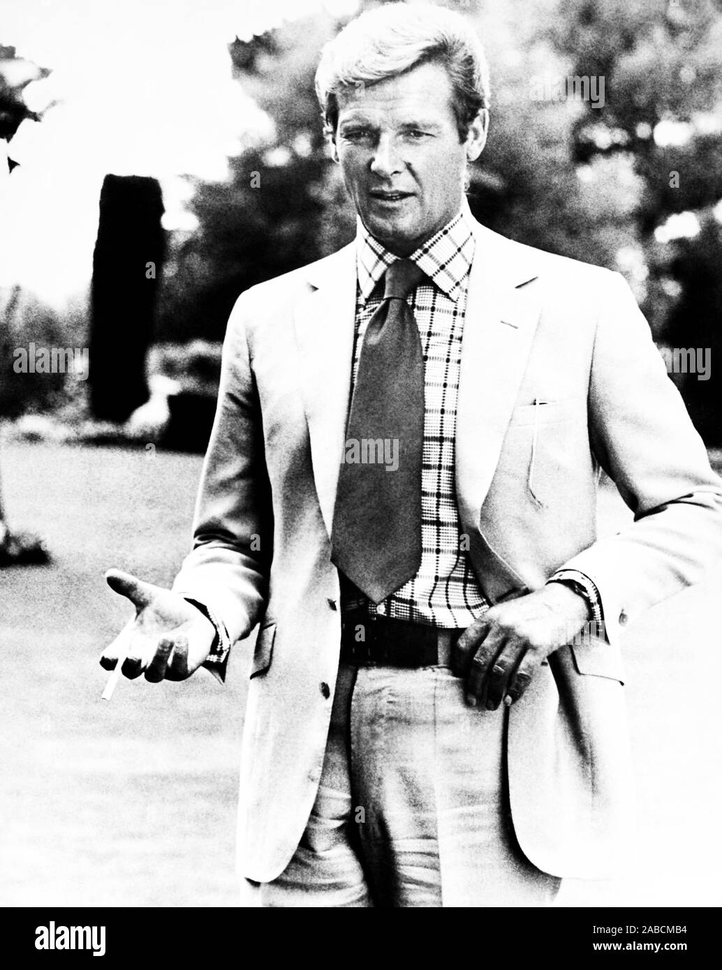 GOLD, Roger Moore, 1974 Stock Photo - Alamy