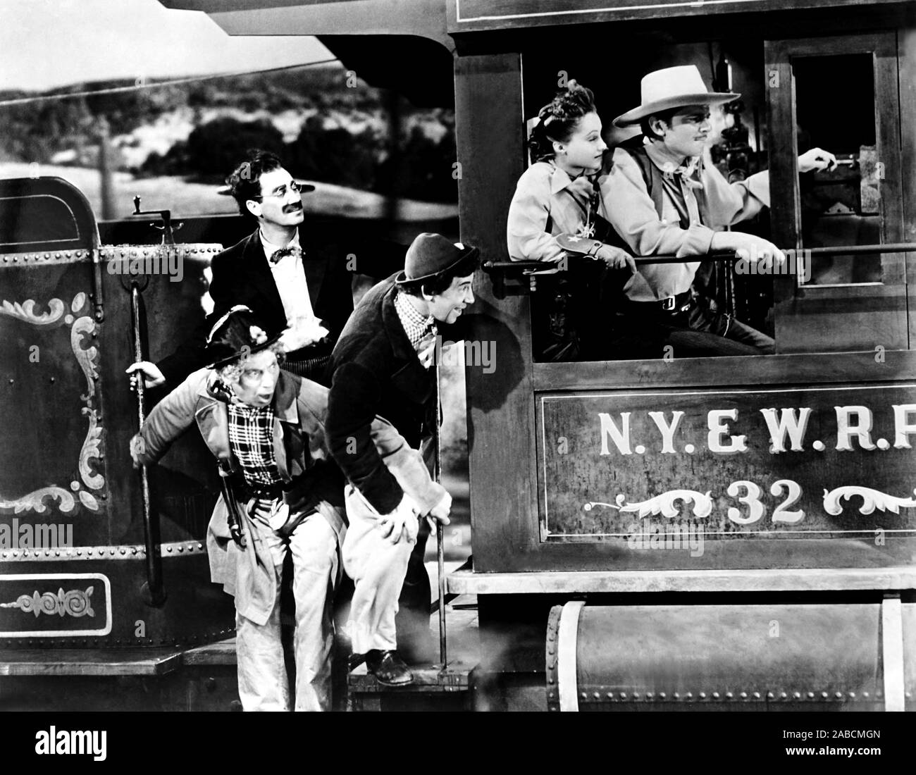 GO WEST, from left, Harpo Marx, Groucho Marx, Chico Marx, Diana Lewis ...