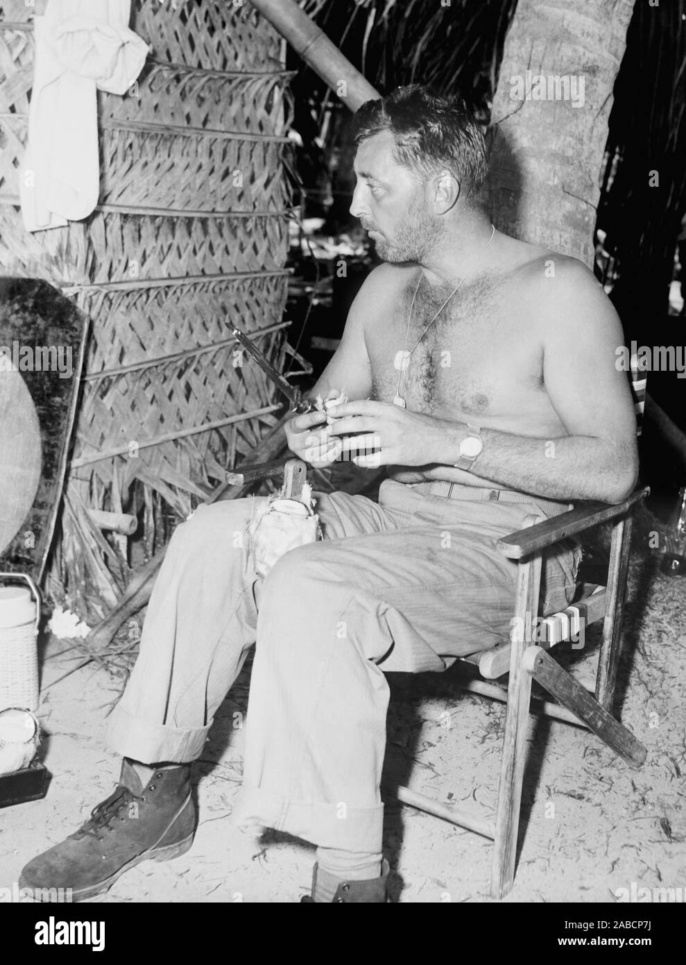 HEAVEN KNOWS, MR. ALLISON, Robert Mitchum on set, 1957, TM & Copyright ...