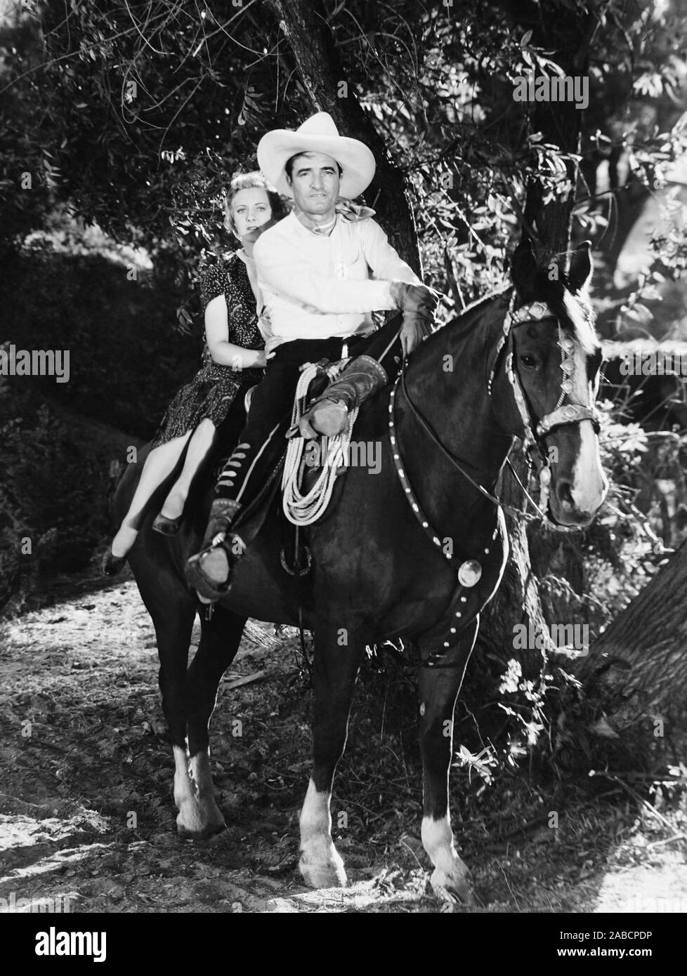 HIDDEN GOLD, from left: Judith Barrie, Tom Mix, 1932 Stock Photo - Alamy