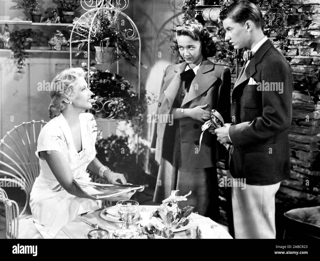 HOLIDAY IN MEXICO, from left, Ilona Massey, Roddy McDowall, Jane Powell ...
