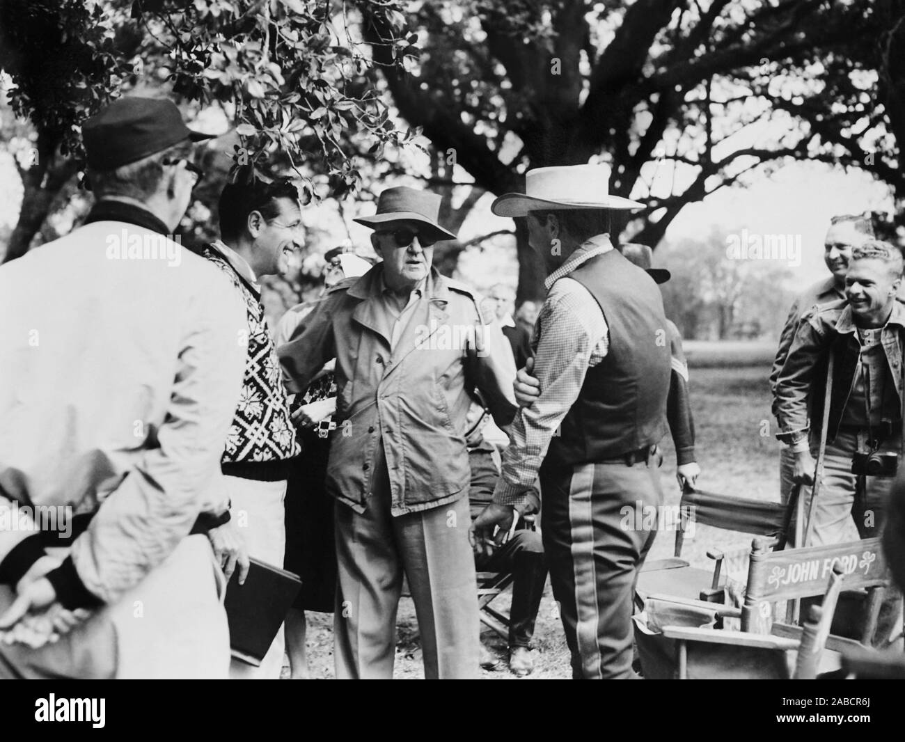 THE HORSE SOLDIERS, director John Ford (center) on set, 1959 Stock ...