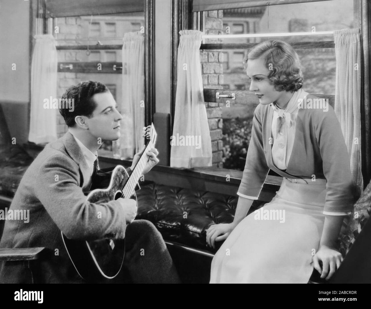 HUDDLE, from left: Ramon Novarro, Madge Evans, 1932 Stock Photo - Alamy