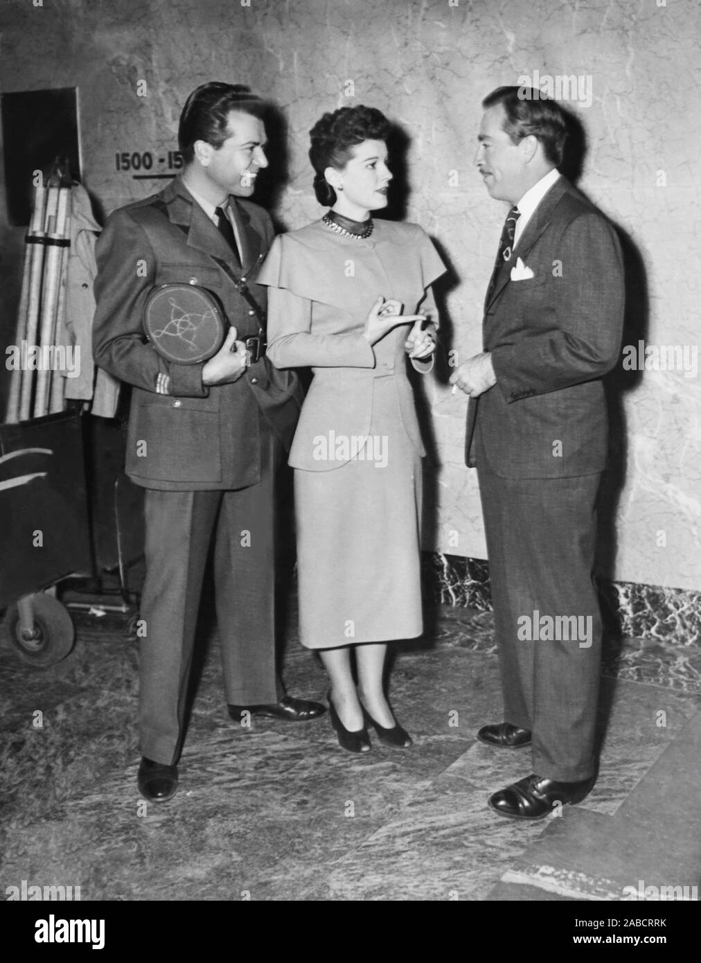 I, JANE DOE, from left: Roger Dann, Ruth Hussey, John Howard on set ...