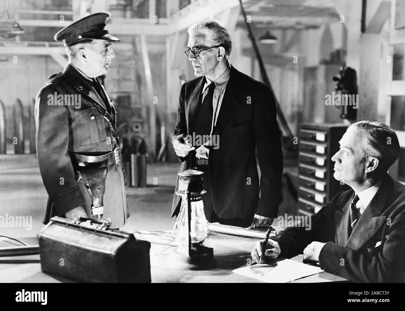 THE INVISIBLE MENACE, from left: Henry Kolker, Boris Karloff, Charles ...