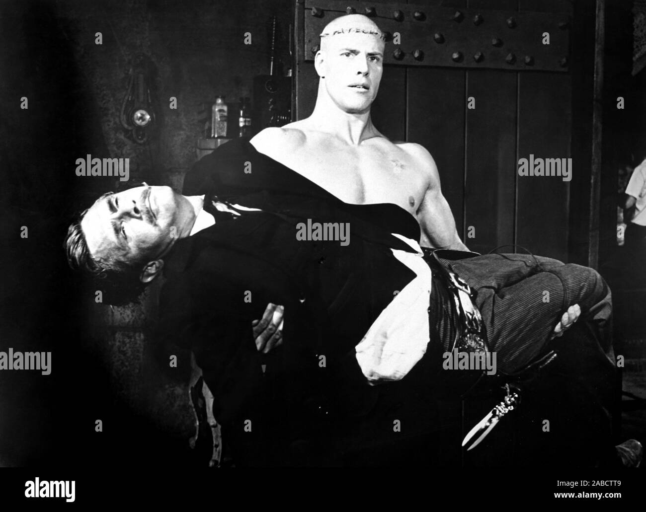 JESSE JAMES MEETS FRANKENSTEIN'S DAUGHTER, John Lupton, carrying Cal ...