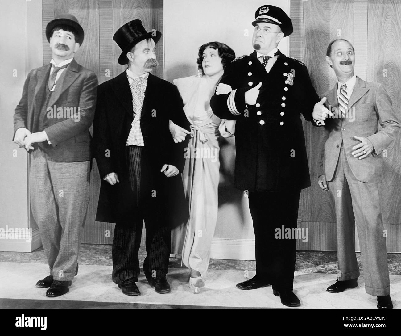KEYSTONE HOTEL, from left: Hank Mann, Chester Conklin, Marie Prevost ...