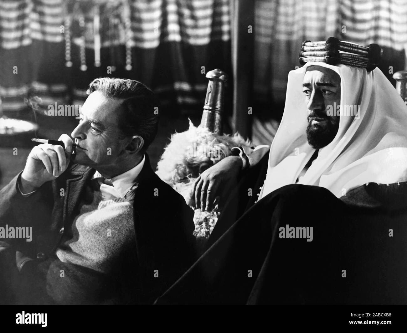 LAWRENCE OF ARABIA, director David Lean (left) and Alec Guinness, on ...