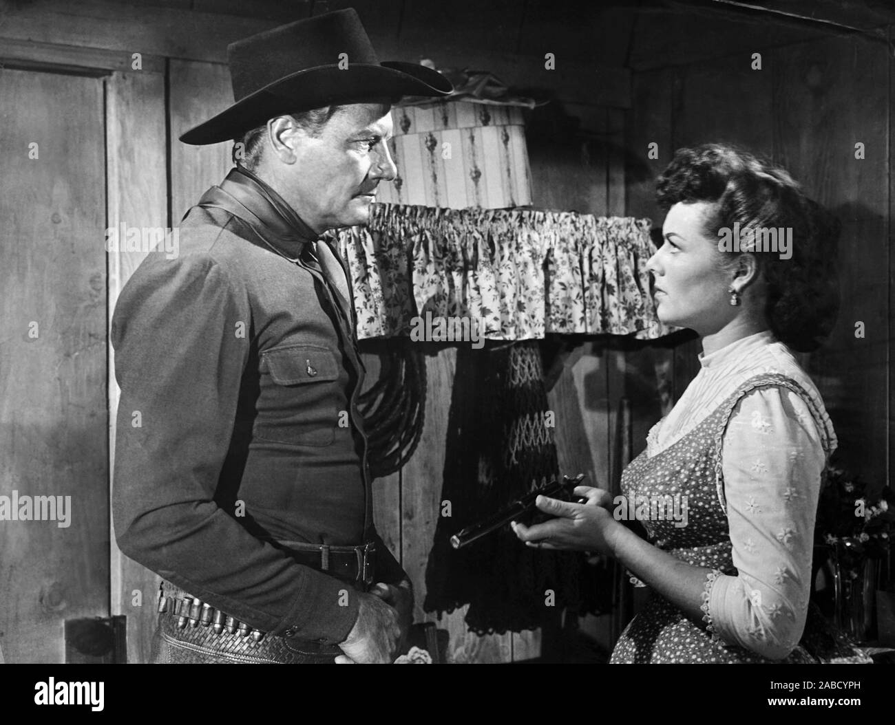 THE LONE HAND, from left: Joel McCrea, Barbara Hale, 1953 Stock Photo ...