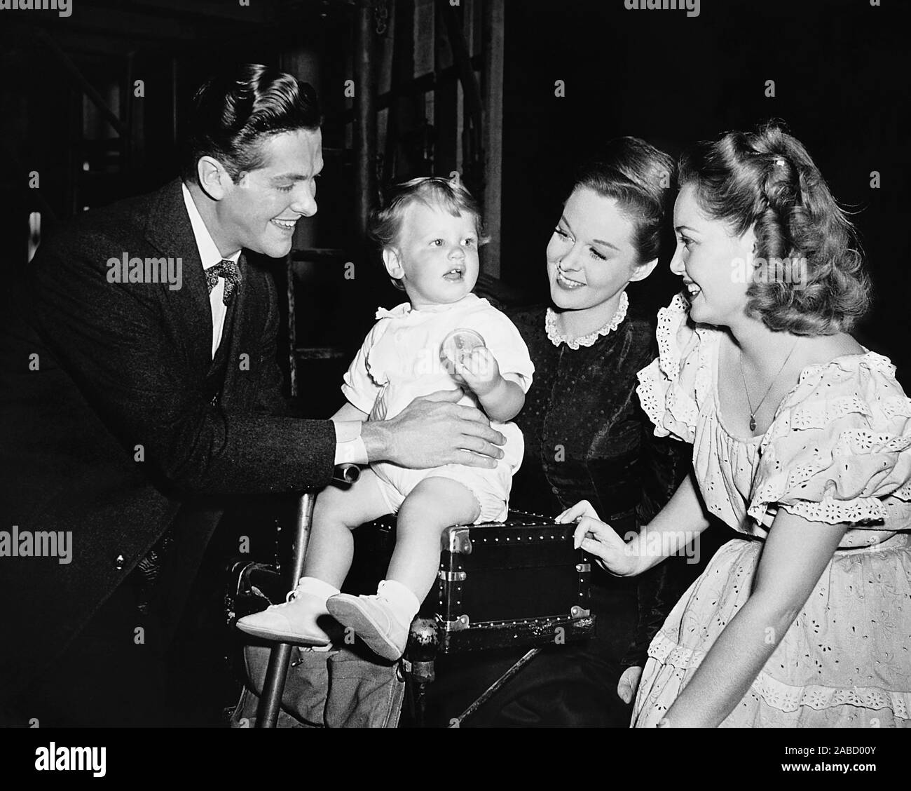 THE LOST MOMENT, from left: Robert Cummings, robert Cummings Jr. Susan ...