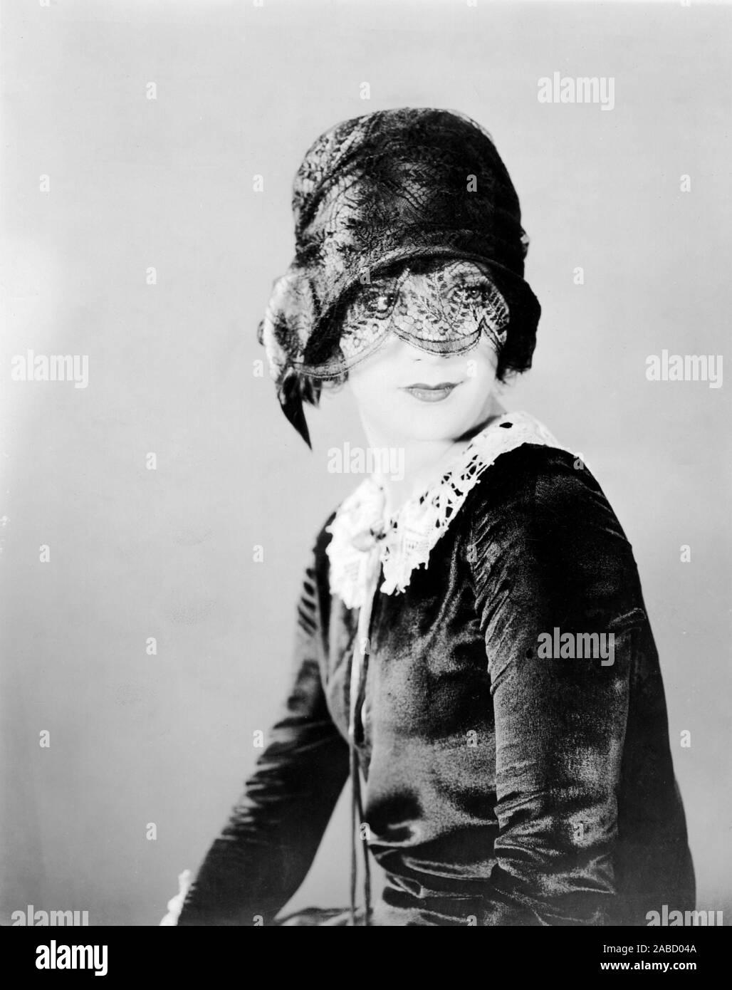 THE LOVE TOY, Helene Costello, in a black satin and shadow lace hat ...