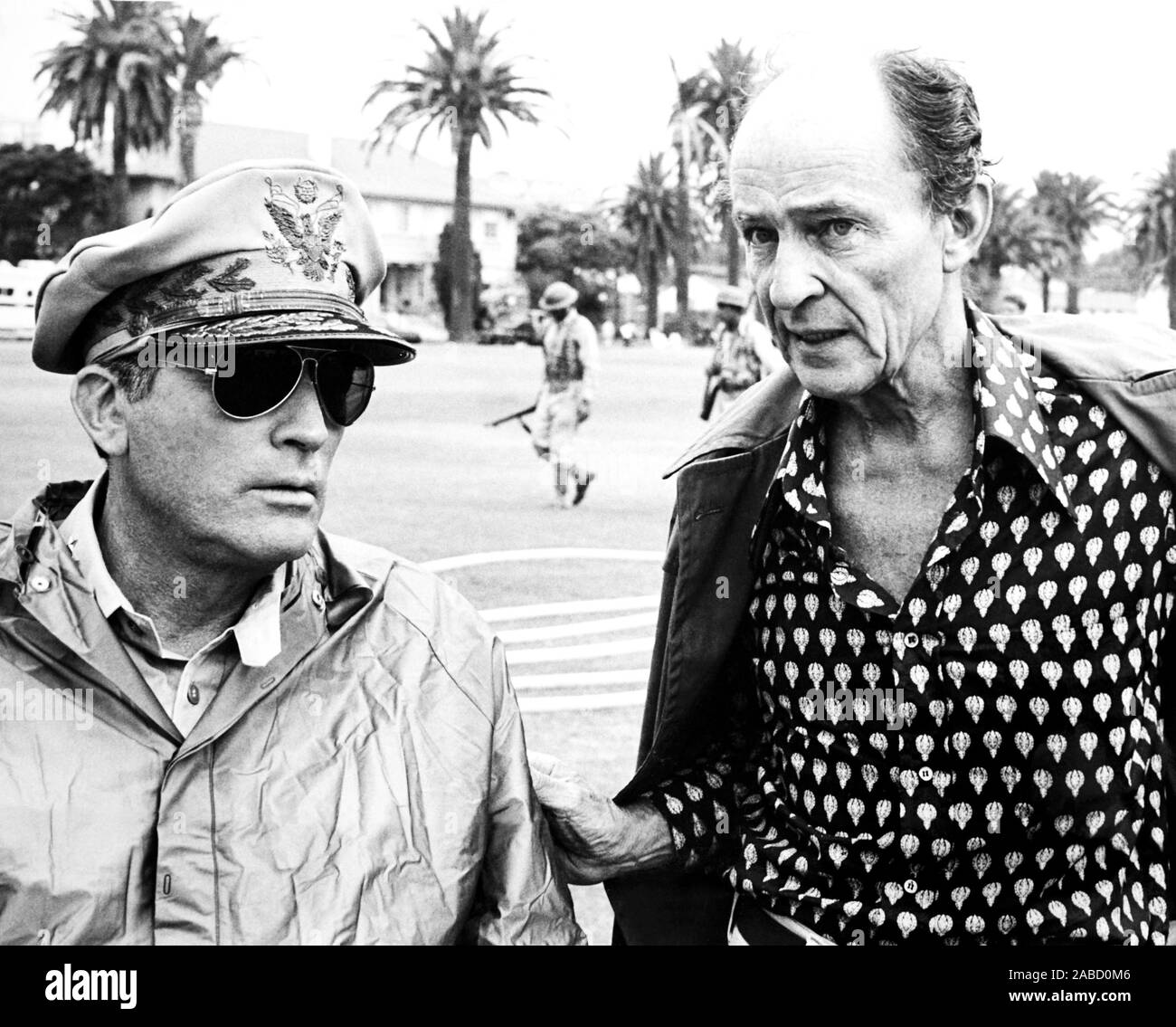 MacARTHUR, from left, Gregory Peck, director Joseph Sargent, on-set ...