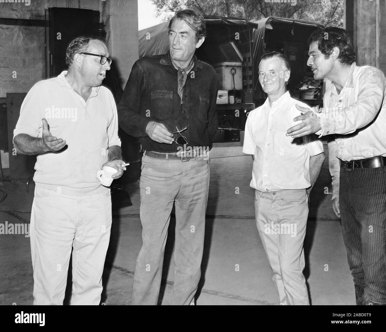 MACKENNA'S GOLD, from left: screenwriter Carl foreman, Gregory Peck ...