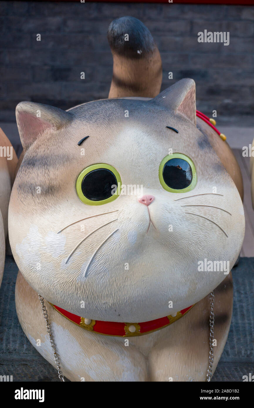 A giant cat is put at the Shenwu Gate of the Forbidden City in Beijing ...