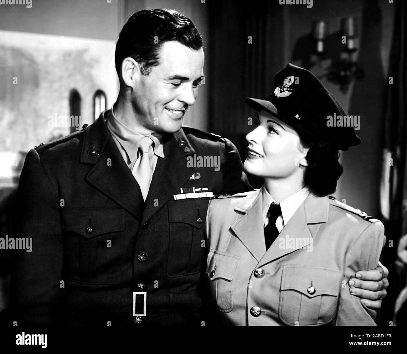 MARINE RAIDERS, from left, Robert Ryan, Ruth Hussey, 1944 Stock Photo ...