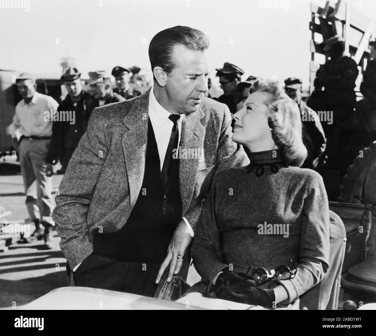 THE MCCONNELL STORY, from left: Dick Powell visiting June Allyson on location, 1955 Stock Photo ...