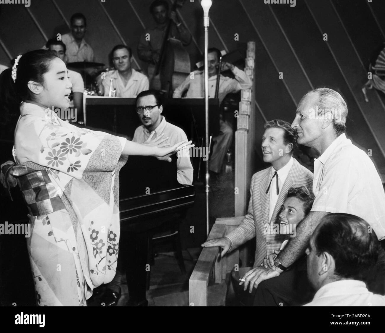 MEET ME IN LAS VEGAS, from left: Mitsuko Sawamura, Pete Rugulo (at piano), Dan Dailey, dance ...