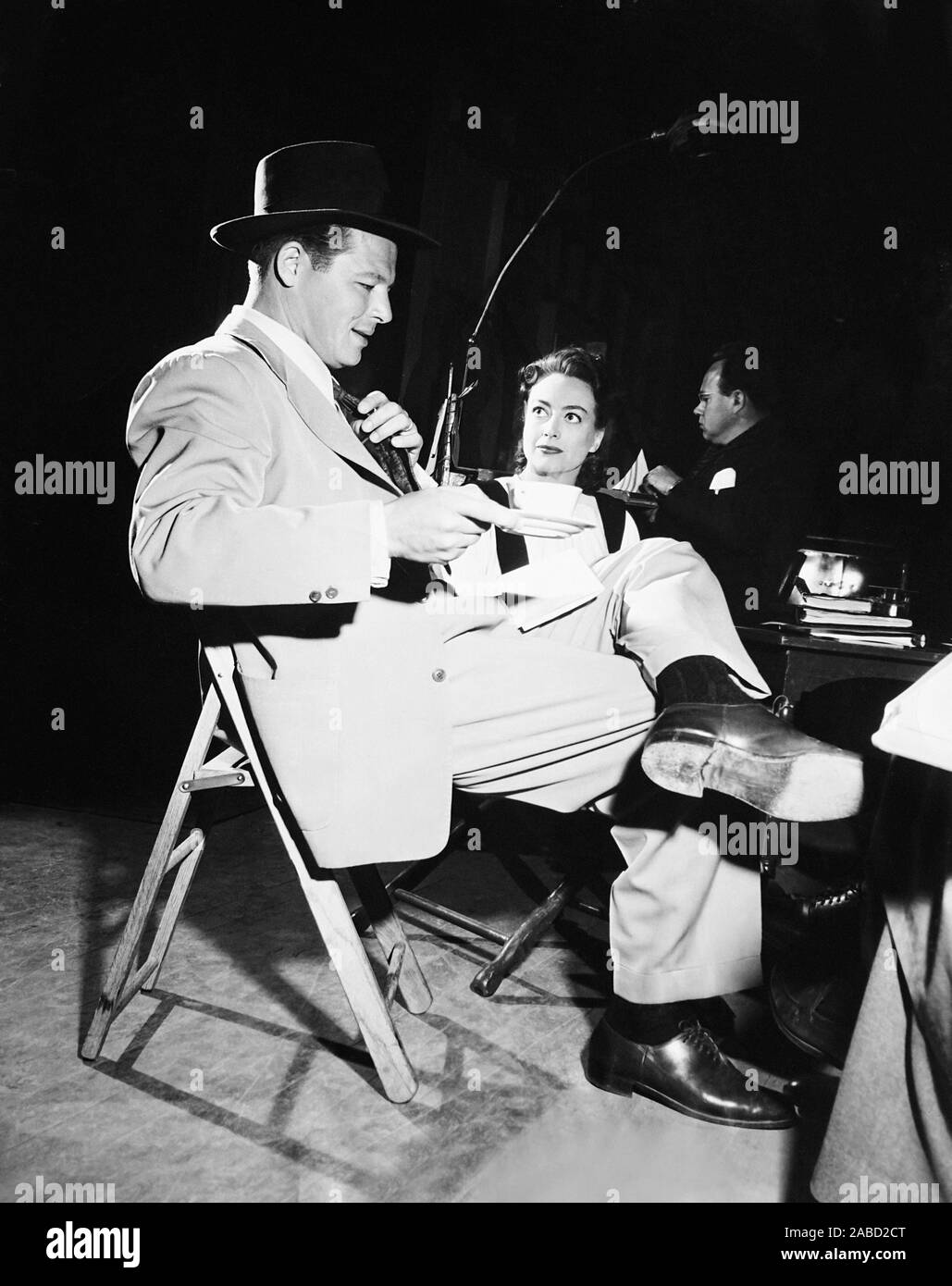MILDRED PIERCE, from left: Jack Carson, Joan Crawford on set, 1945 ...