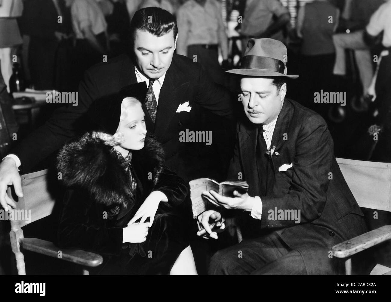 MORE THAN A SECRETARY, from left: Dorothea Kent, George Brent, director Alfred E. Green on set ...