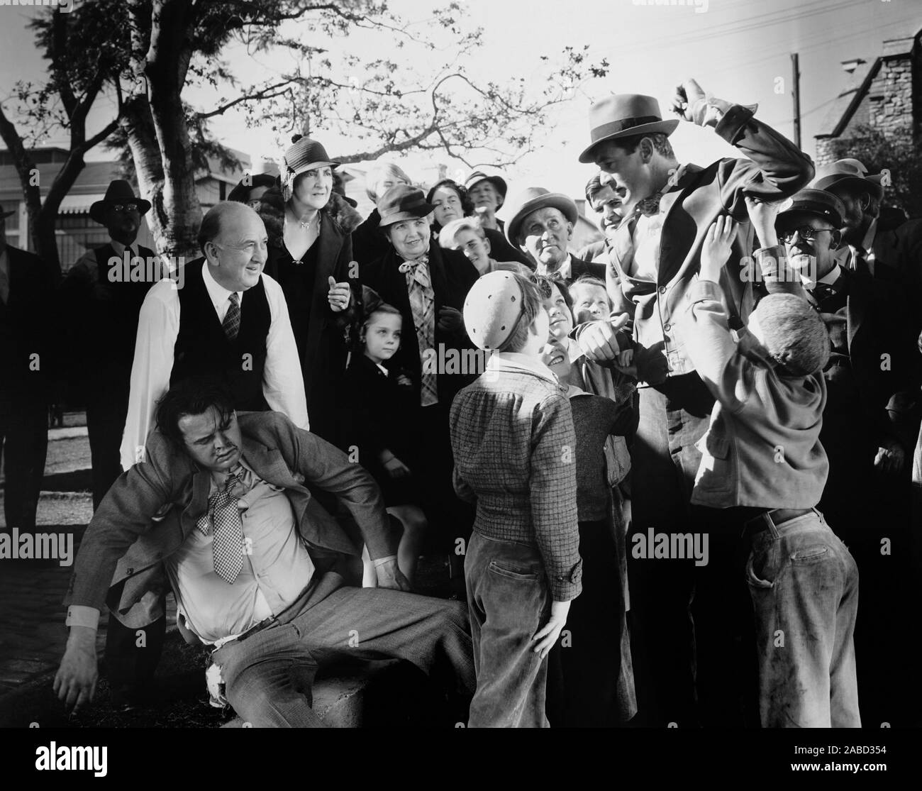 MR. DEEDS GOES TO TOWN, Oliver Eckhardt holding Chuck Hamilton, Gary ...