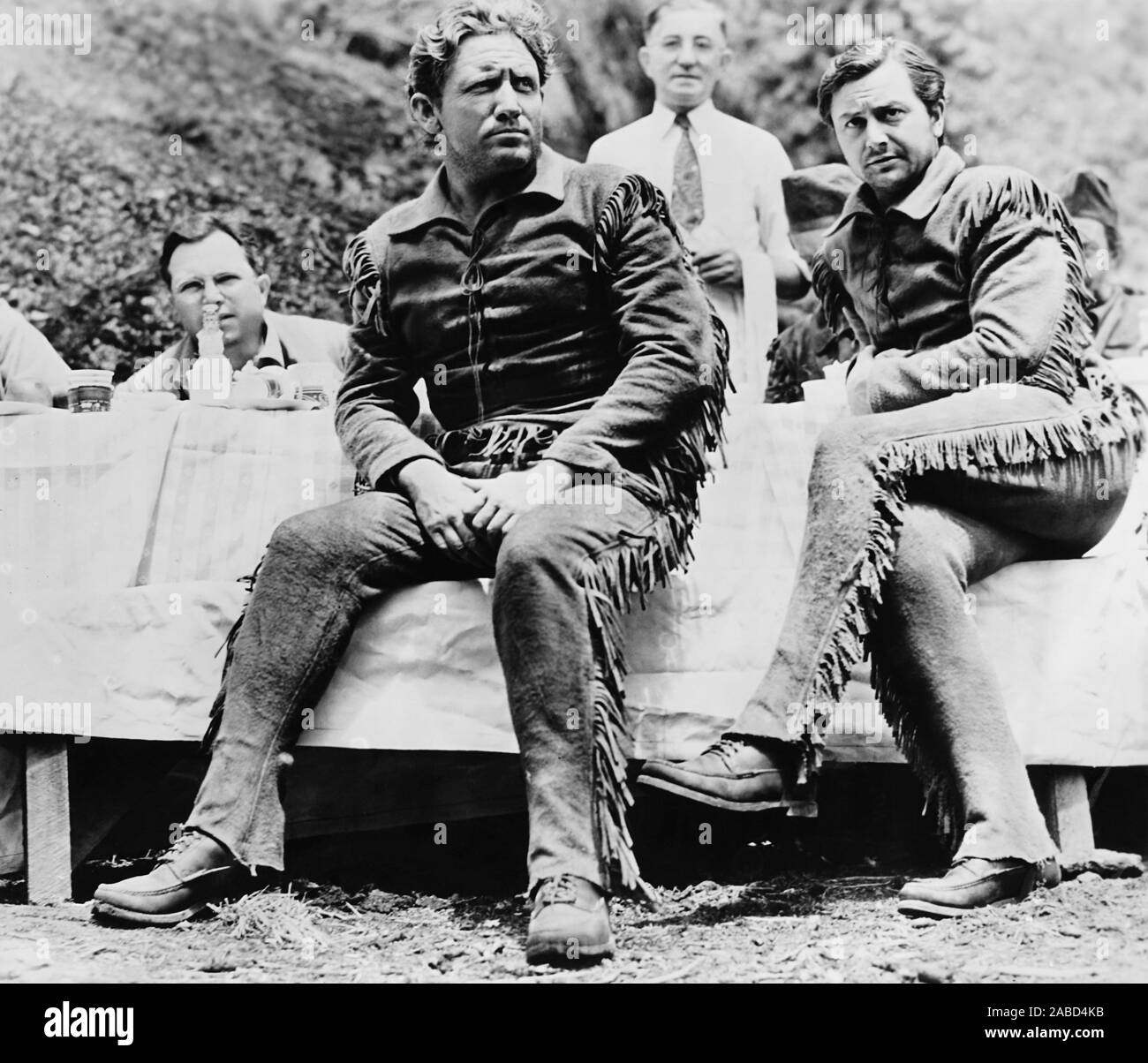 NORTHWEST PASSAGE, seated from left: director King Vidor (rear ...